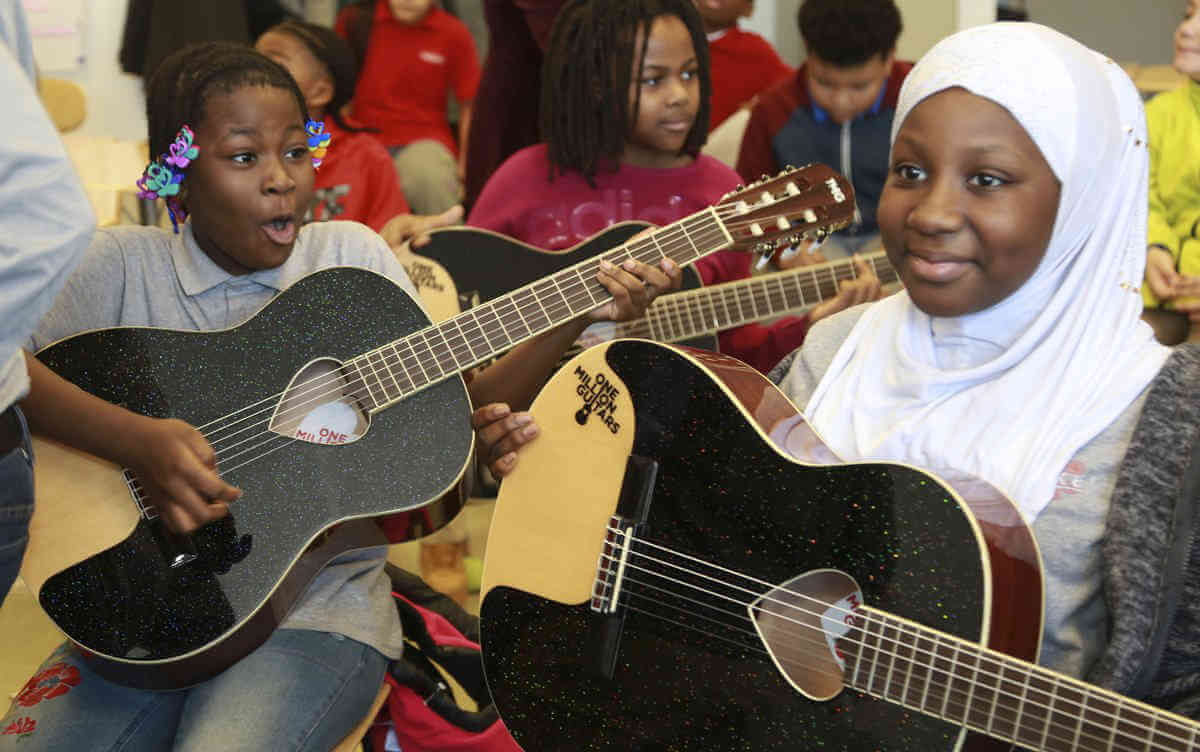 Heketi Students Receive Donated Guitars – Bronx Times