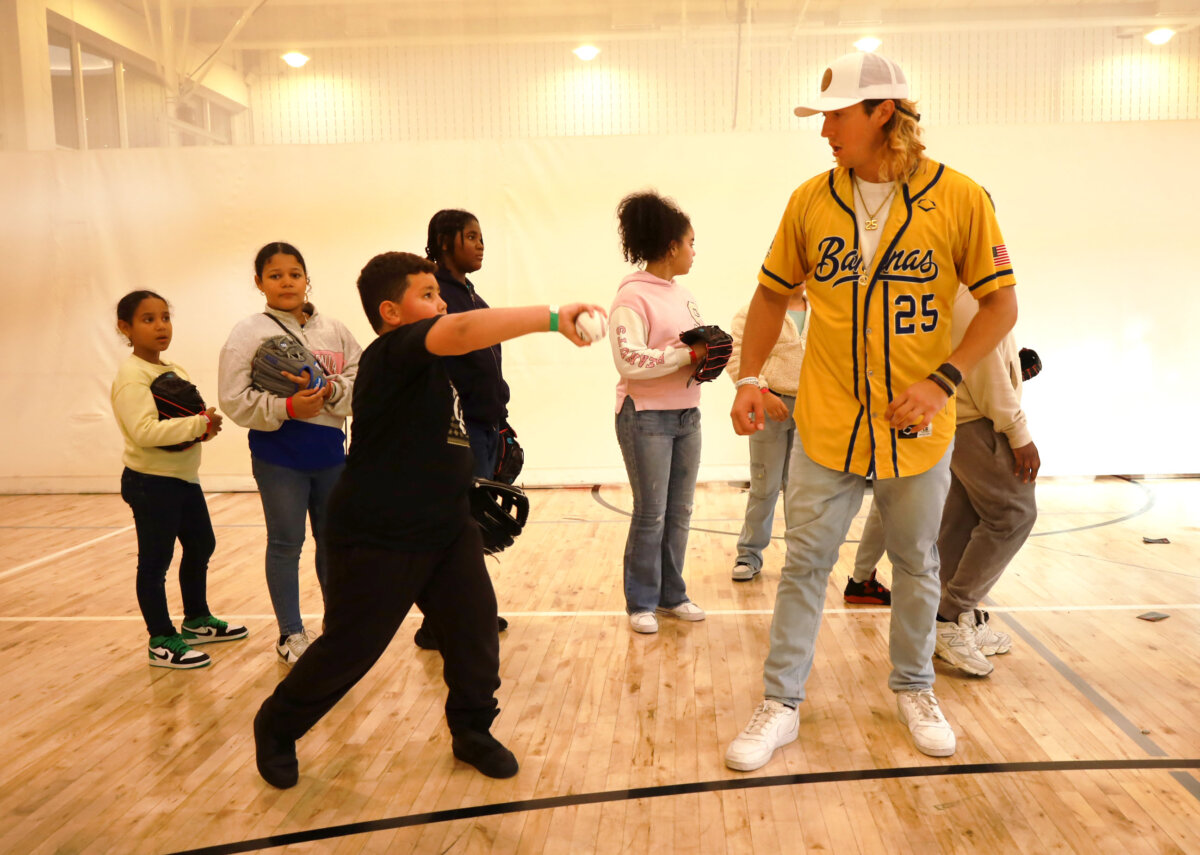 Touchdown! Jets star Garrett Wilson tosses pigskin around at Melrose ...