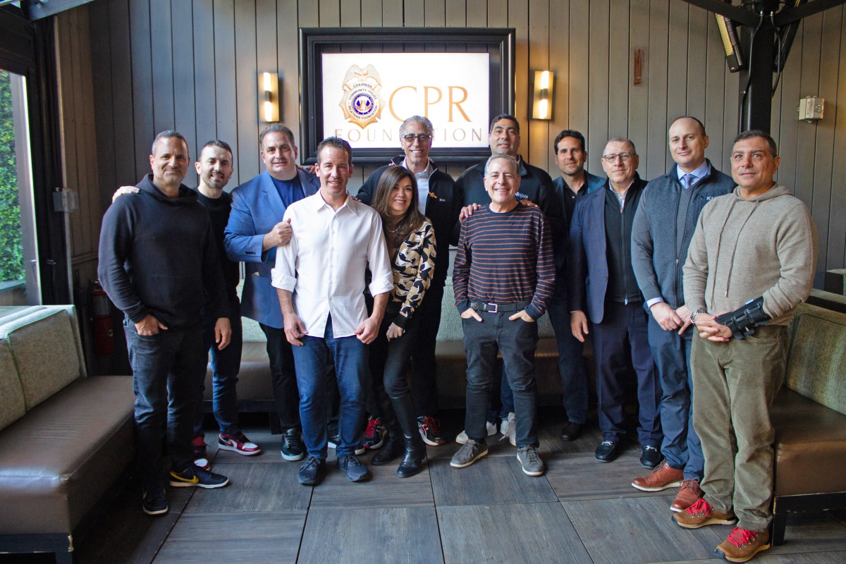 Community members and officers enjoy a dinner hosted by the Community ...